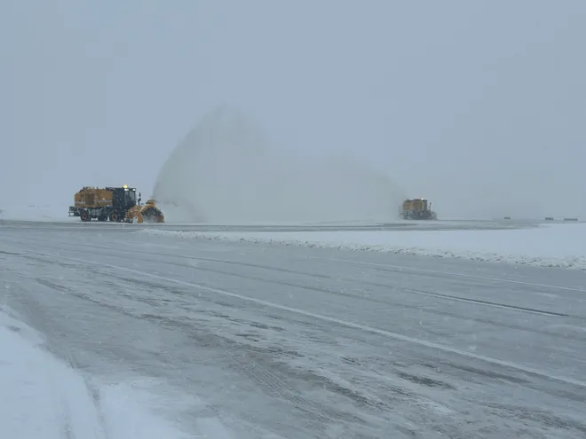 Snow and ice storm close airports, schools, offices; hospitals open ...