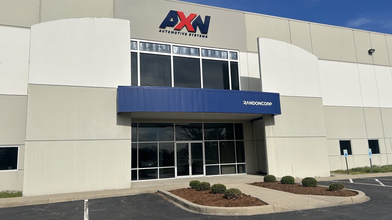 AXN Automotive Systems opens relocated Louisville operations after $15M ...